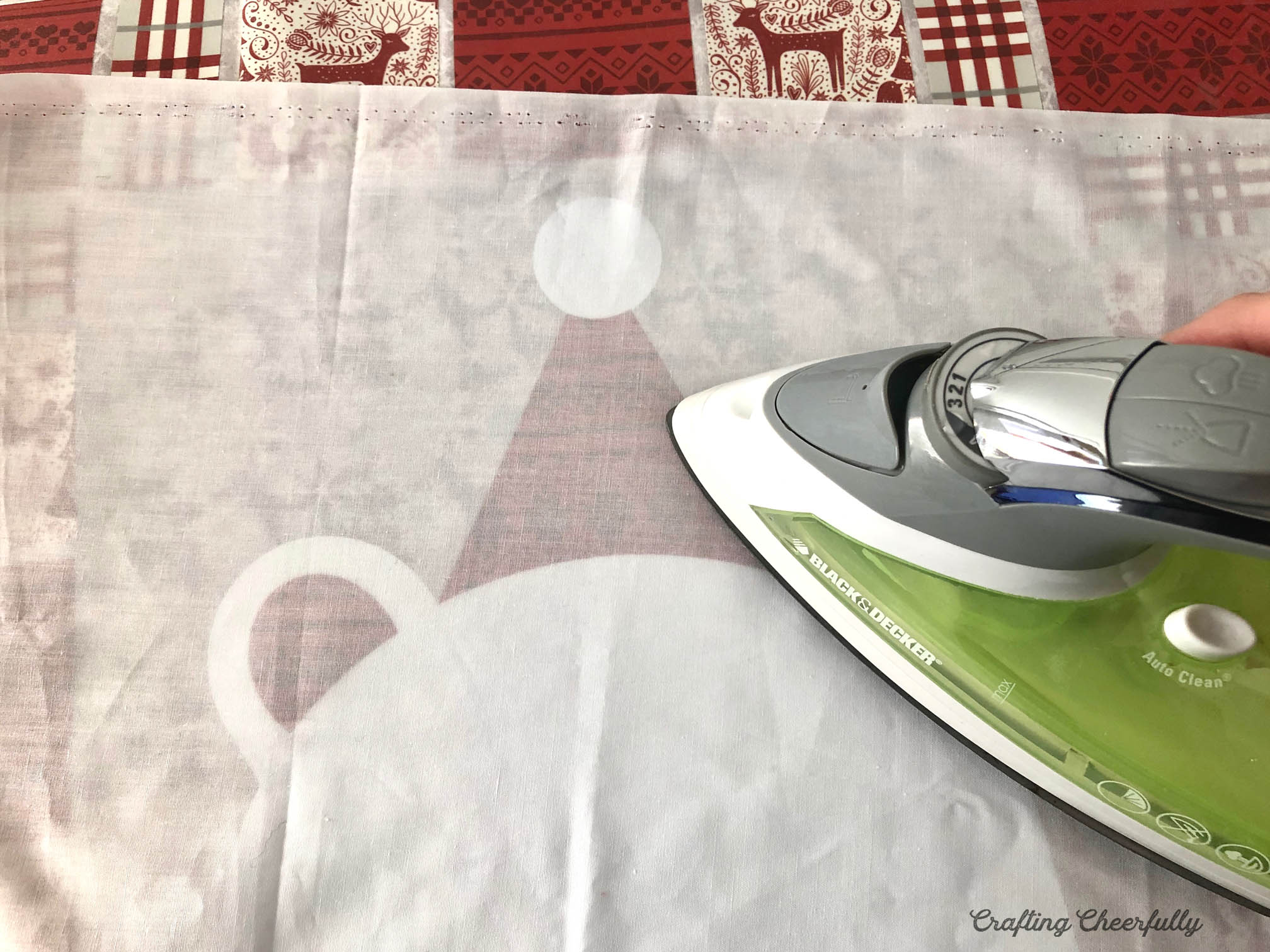 DIY Holiday Pillow with Cricut Patterned Iron-On - Crafting Cheerfully