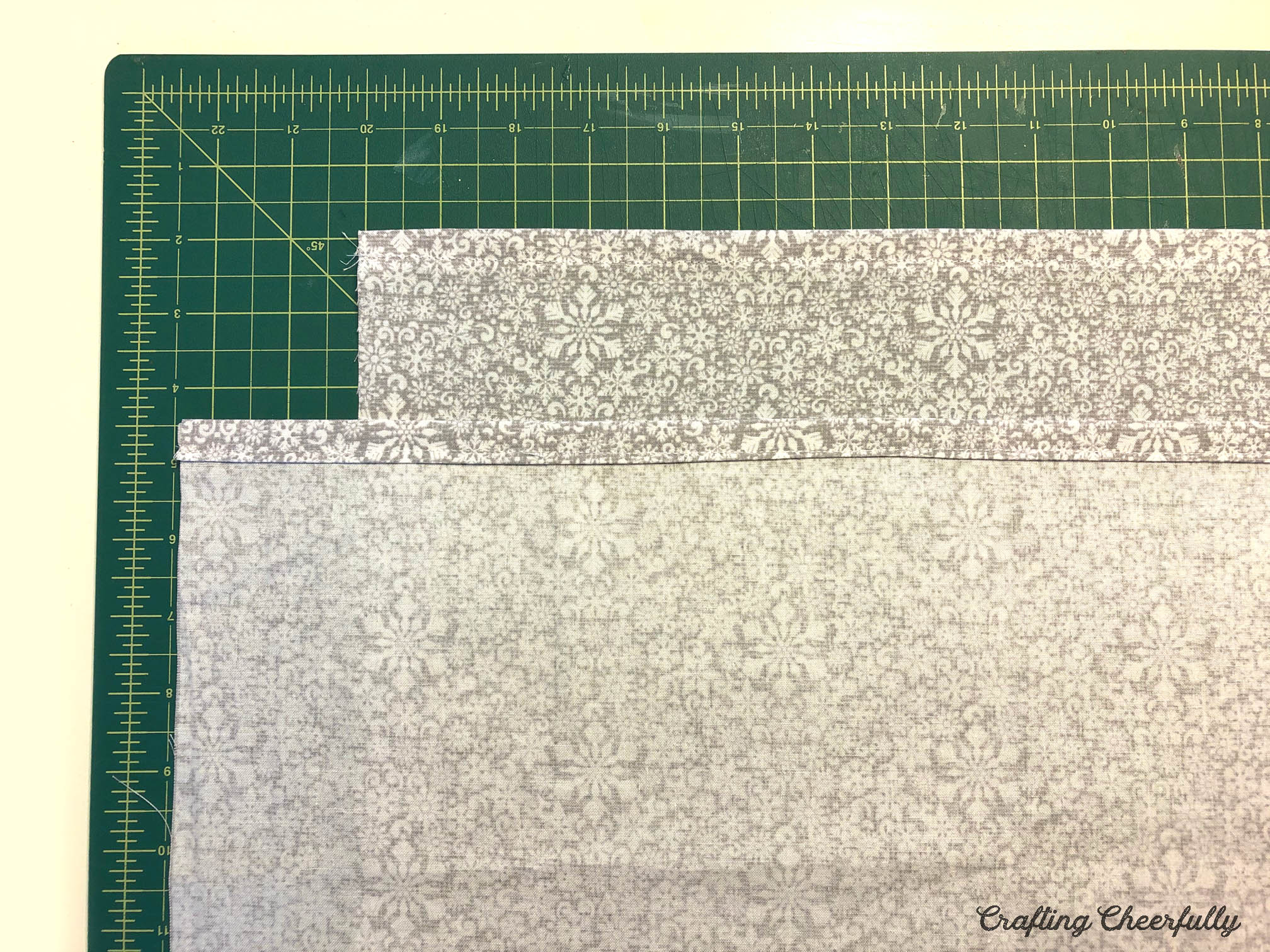 DIY Holiday Pillow with Cricut Patterned Iron-On - Crafting Cheerfully