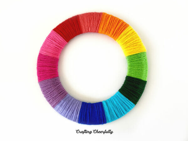 DIY Yarn Rainbow Wreath - Crafting Cheerfully