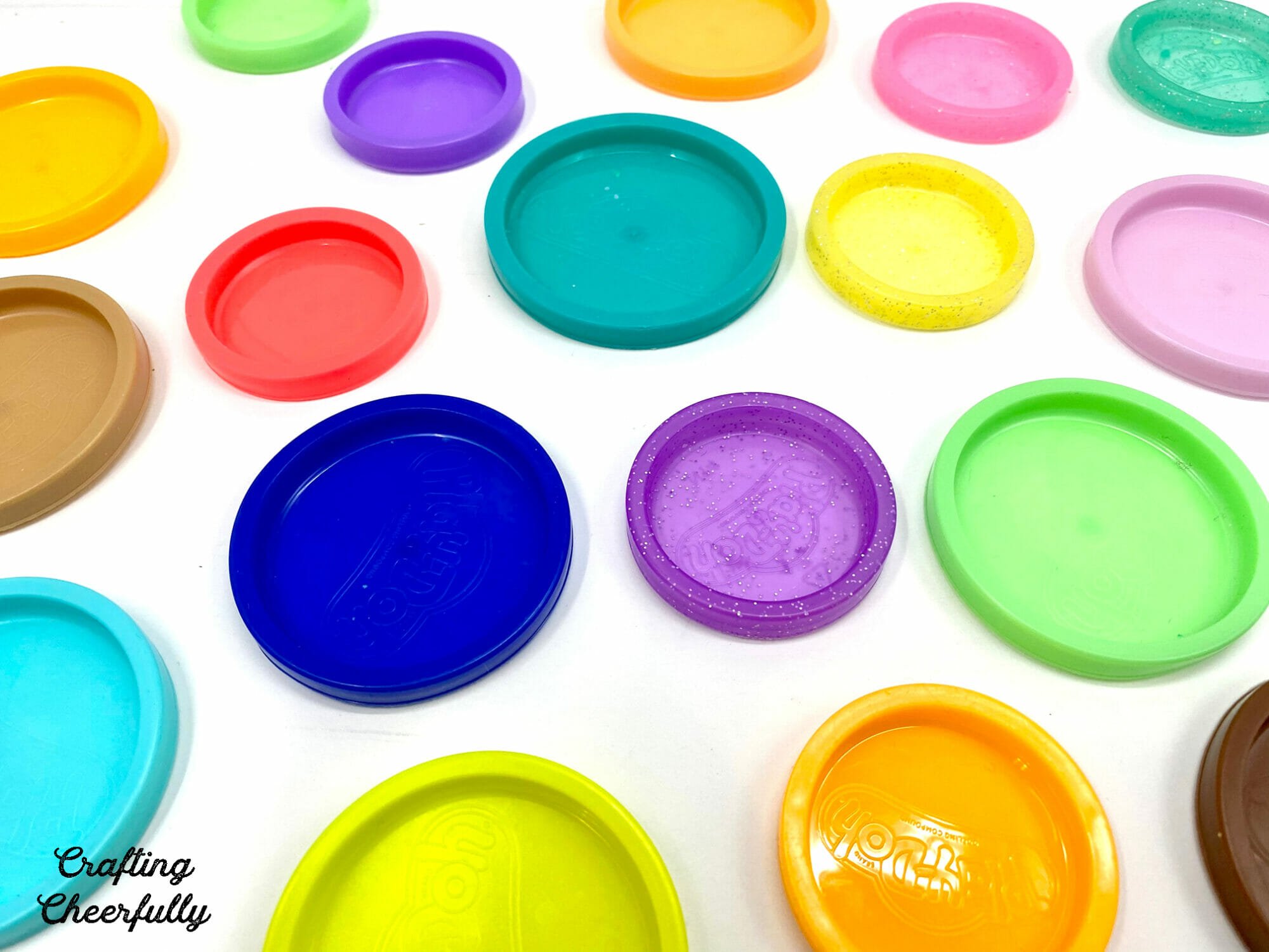 Recycled Play-Doh Lid Ornaments - Crafting Cheerfully