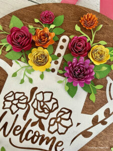 Watering Can Welcome Sign with Paper Flowers - Crafting Cheerfully